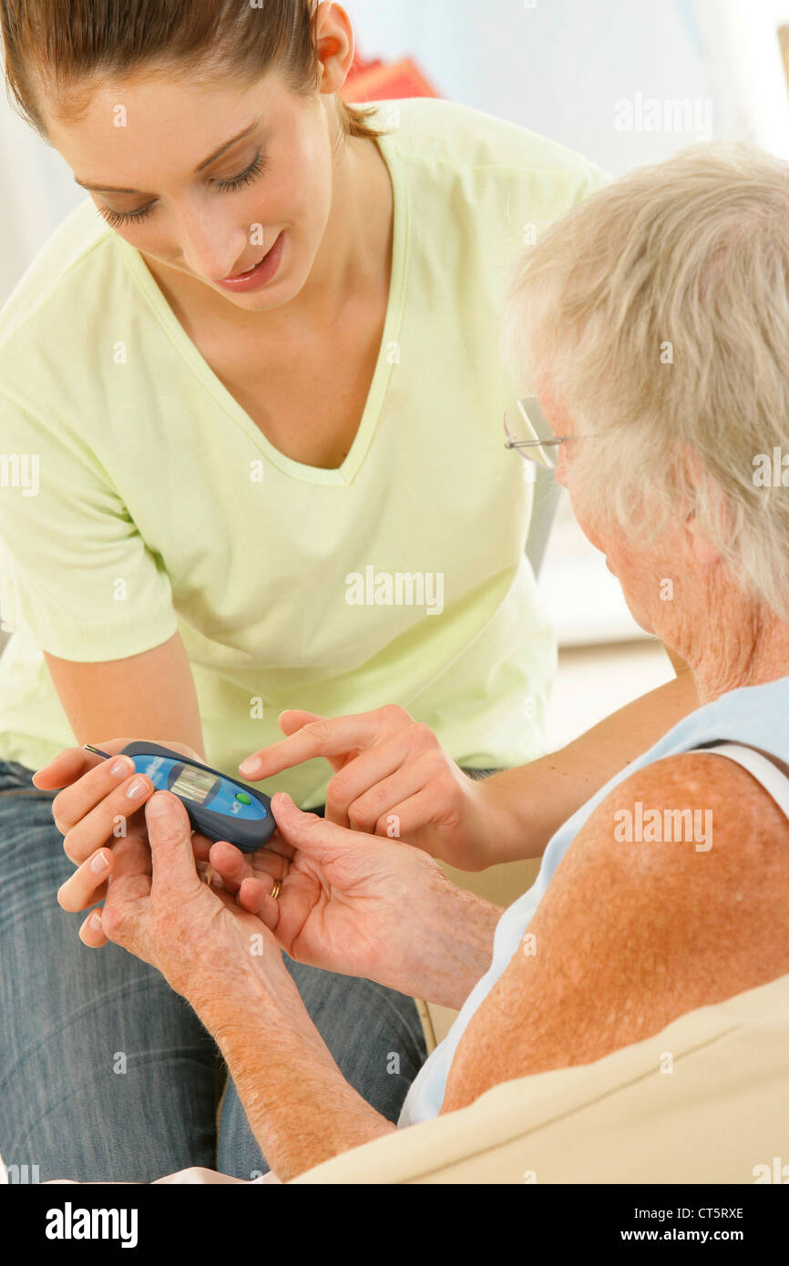 TEST FOR DIABETES ELDERLY PERSON Stock Photo - Alamy