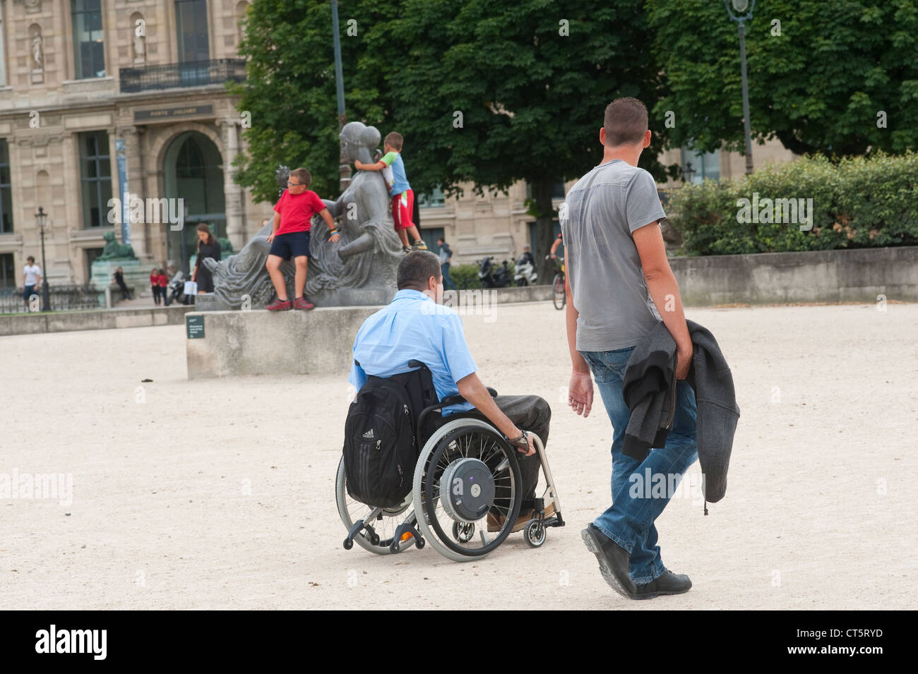 Paris, France - Disabled man on wheelchair Stock Photo - Alamy