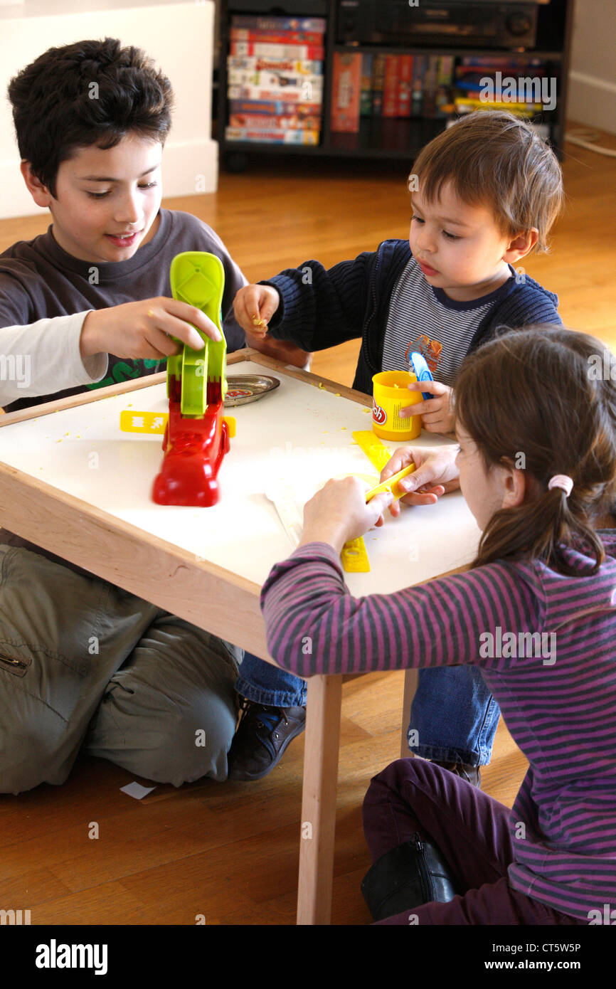 CHILD PLAYING INDOORS Stock Photo - Alamy