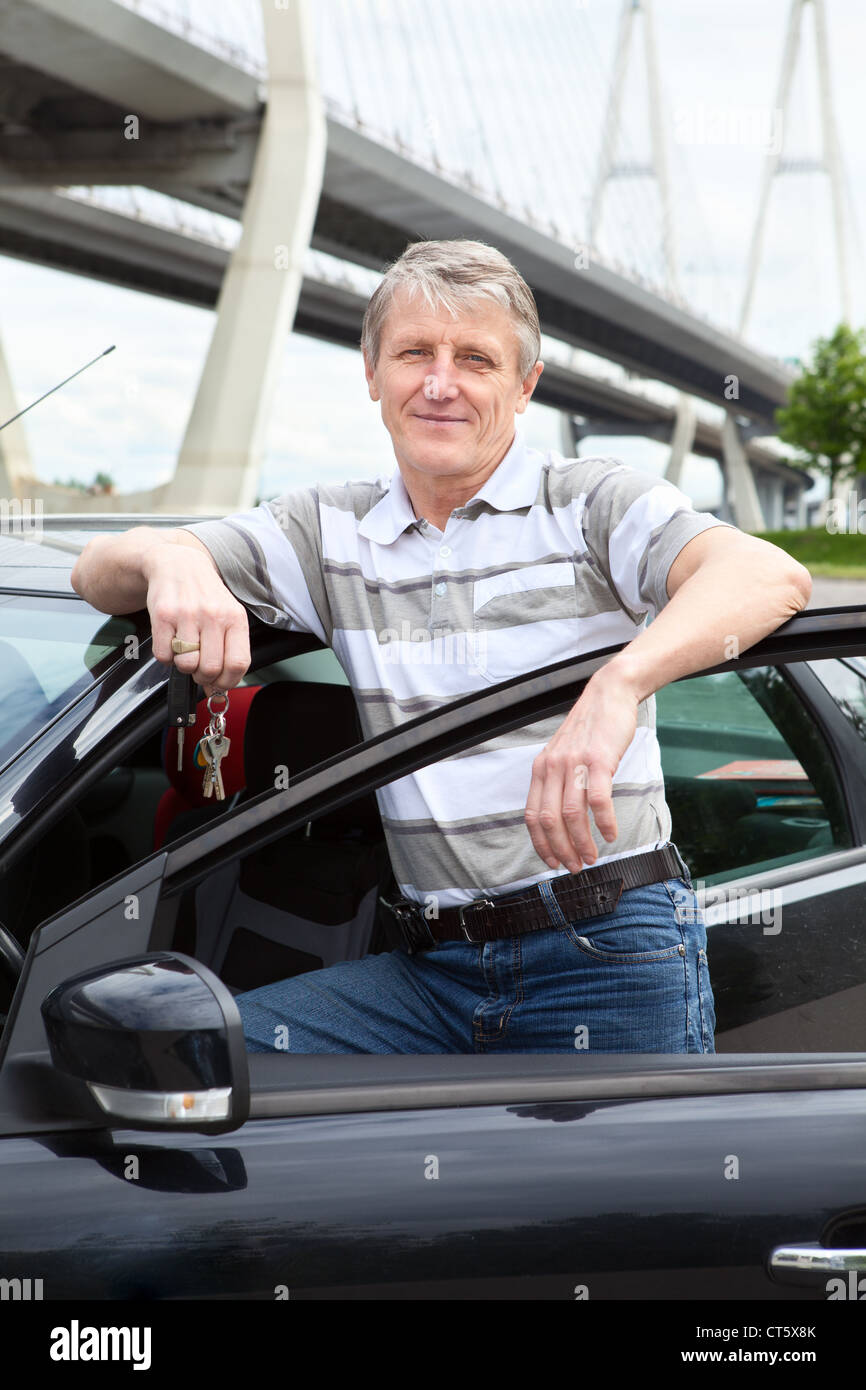 Driver standing near car hi-res stock photography and images - Alamy