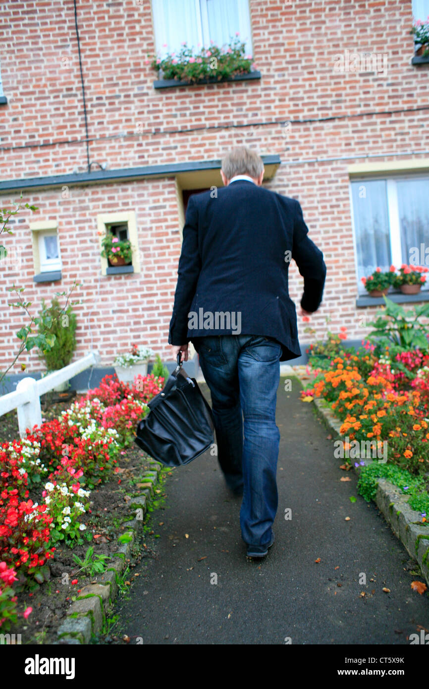 Doctor coming back home hi-res stock photography and images - Alamy