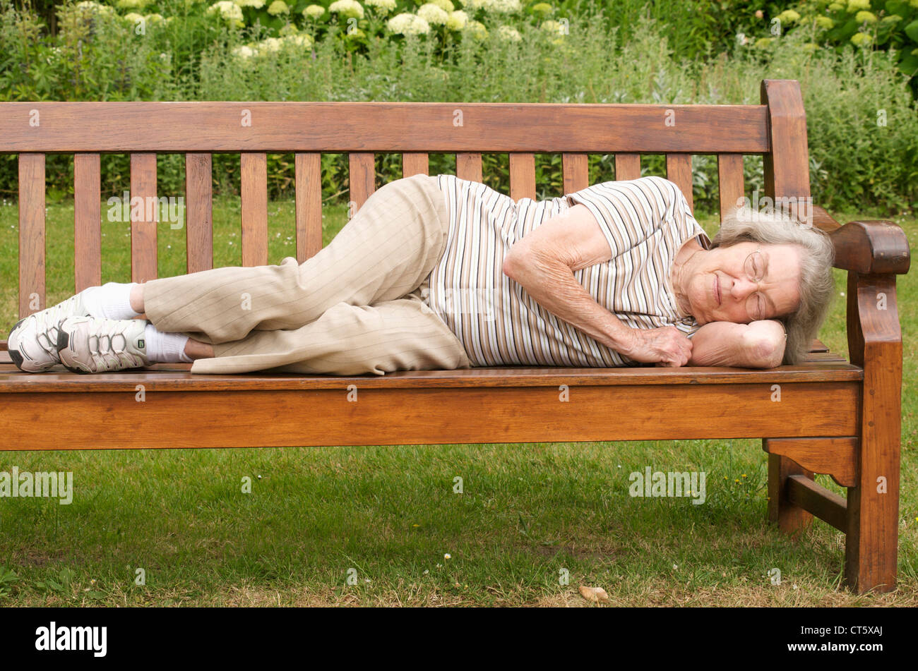 TIRED ELDERLY PERSON Stock Photo - Alamy