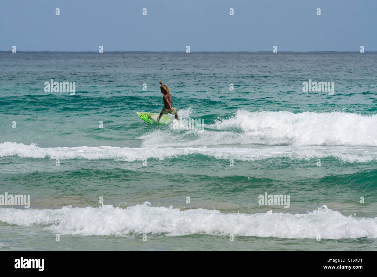 Surfing the beach break at Wizard Beach (First Beach) on Isla ...