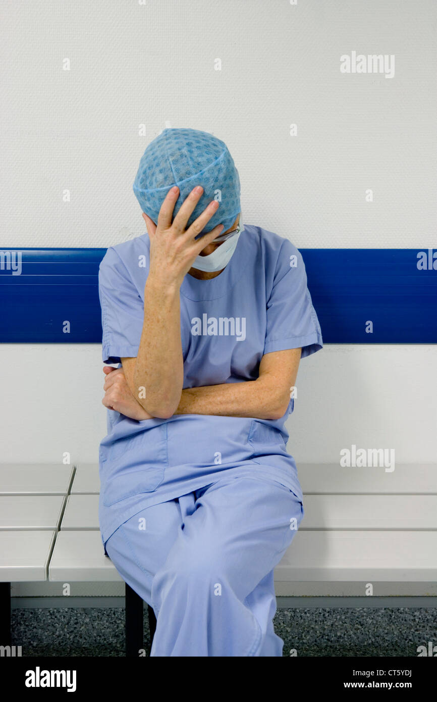 Tired stressed healthcare worker hi-res stock photography and images ...