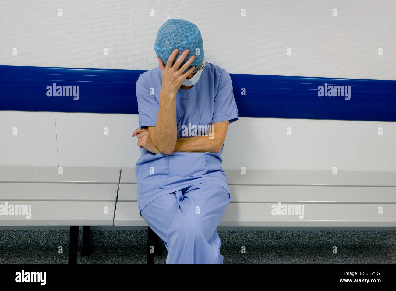 Tired stressed healthcare worker hi-res stock photography and images ...