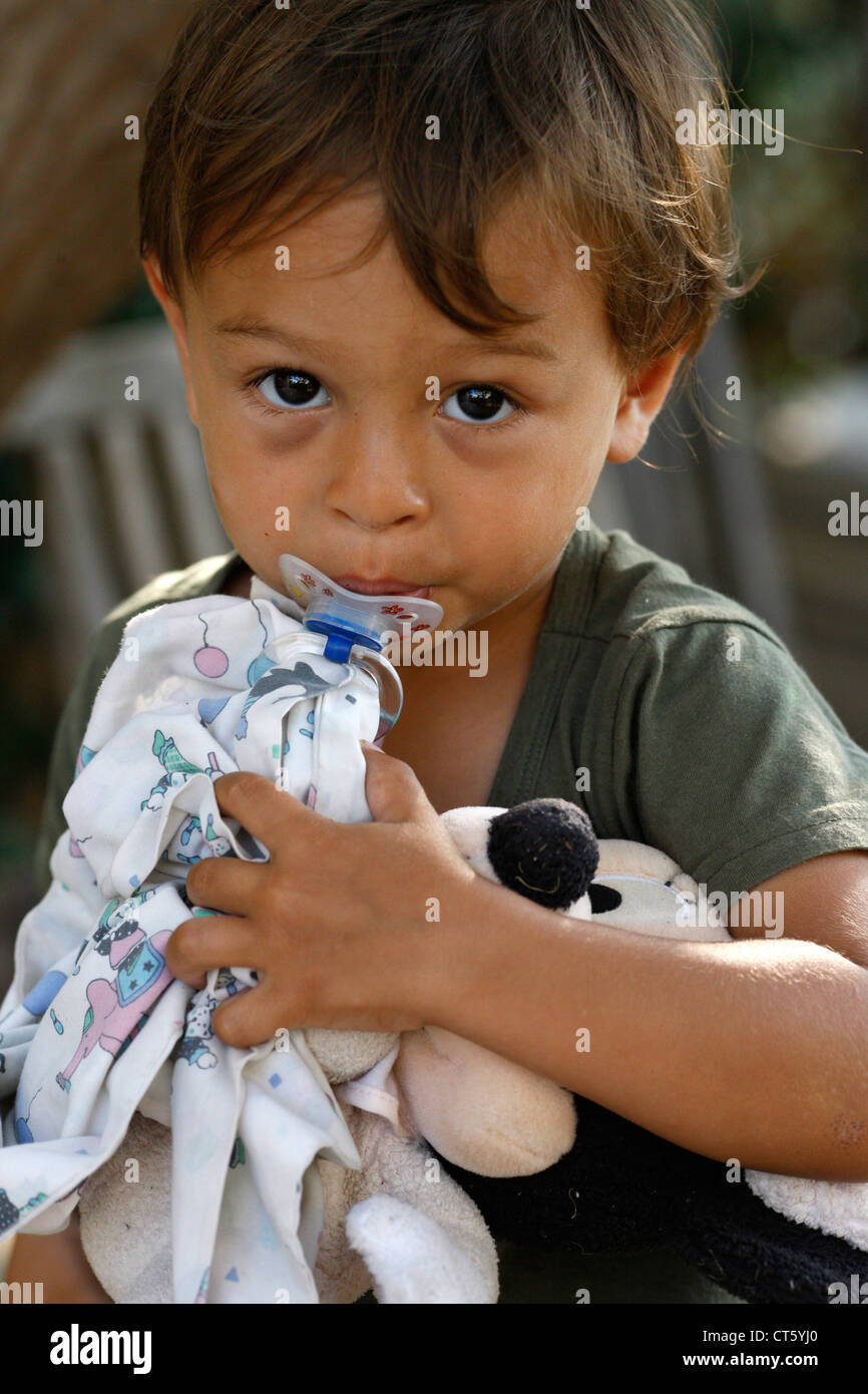 Baby sucking dummy hi-res stock photography and images - Alamy