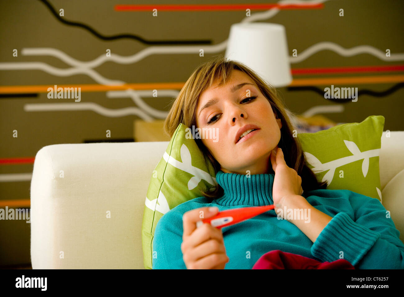 WOMAN WITH FEVER Stock Photo - Alamy