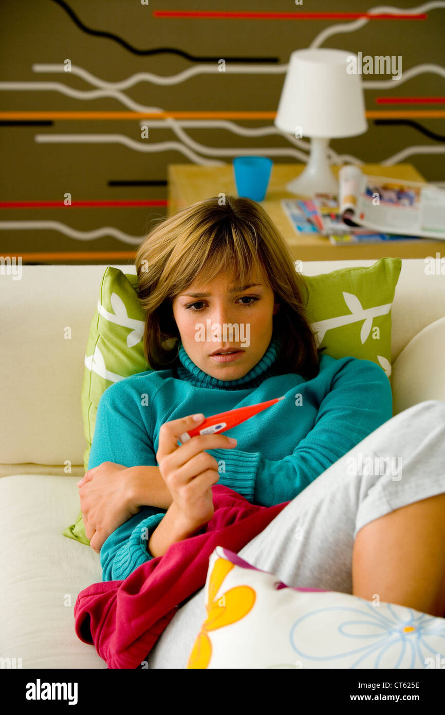 WOMAN WITH FEVER Stock Photo - Alamy