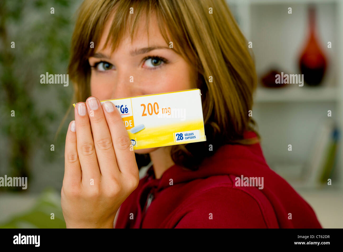 WOMAN TAKING GENERIC DRUG Stock Photo - Alamy