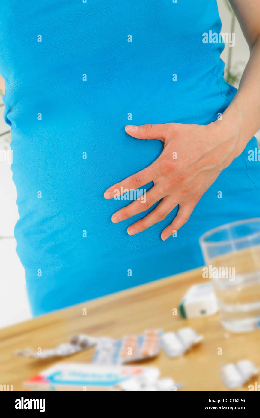 PREGNANT WOMAN TAKING MEDICATION Stock Photo - Alamy