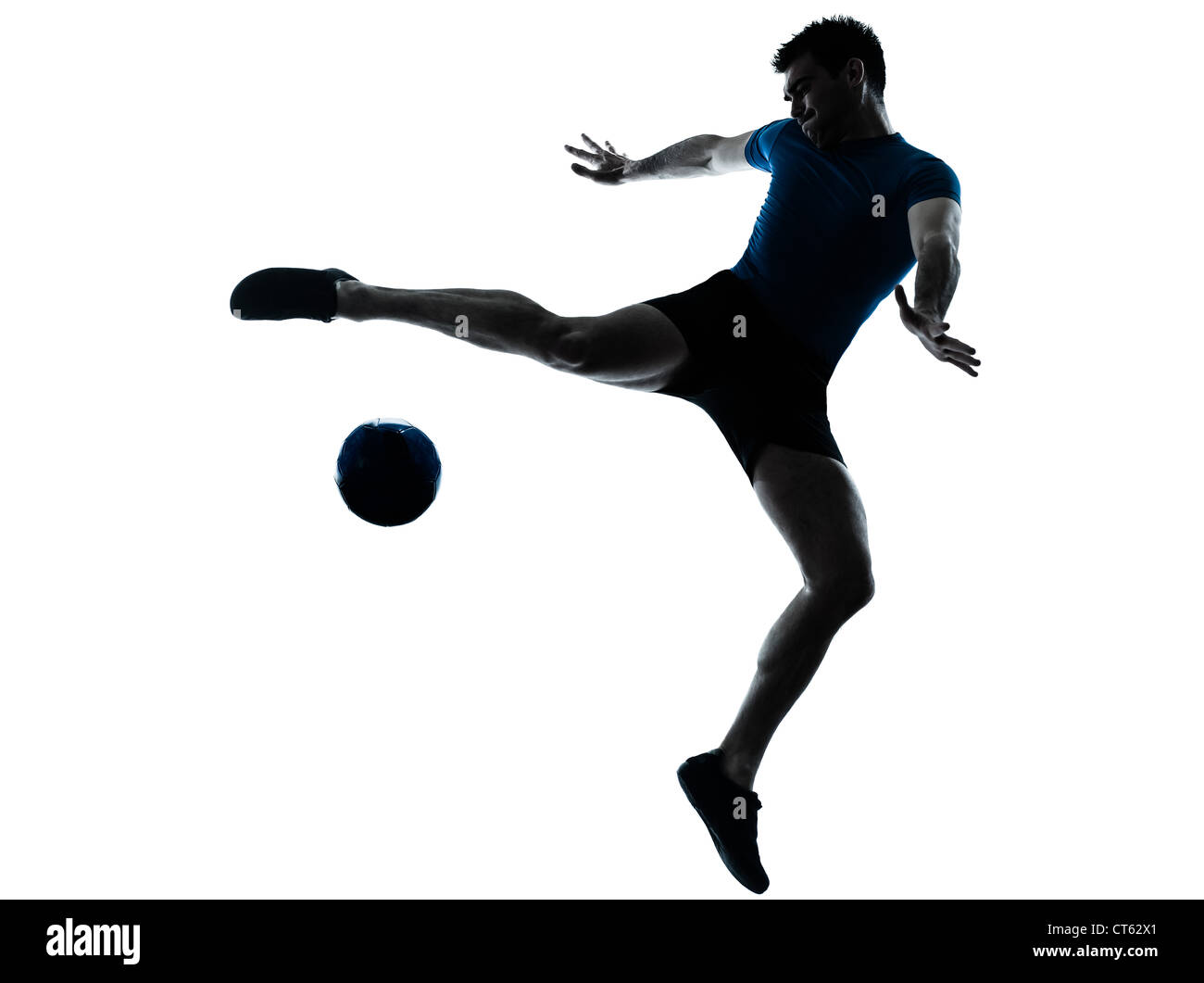 one caucasian man flying kicking playing soccer football player ...