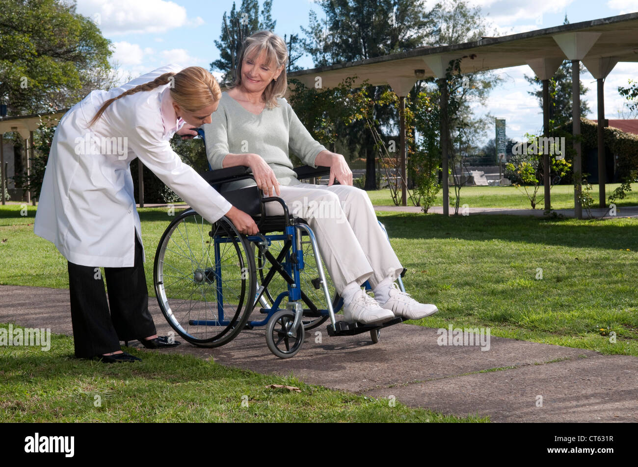 ELDERLY PERSON IN WHEELCHAIR Stock Photo - Alamy