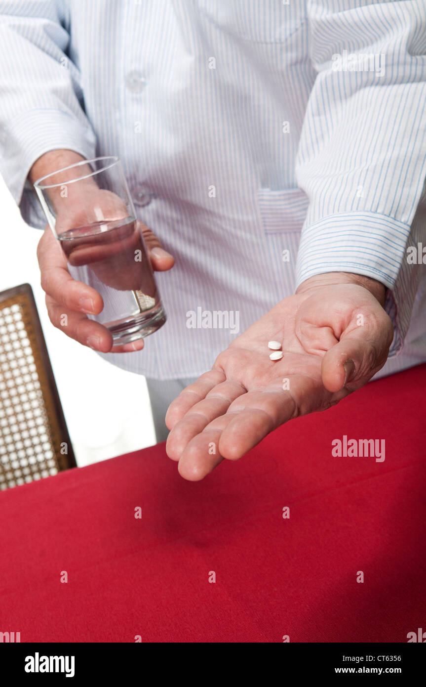 ELDERLY PERSON TAKING MEDICATION Stock Photo - Alamy