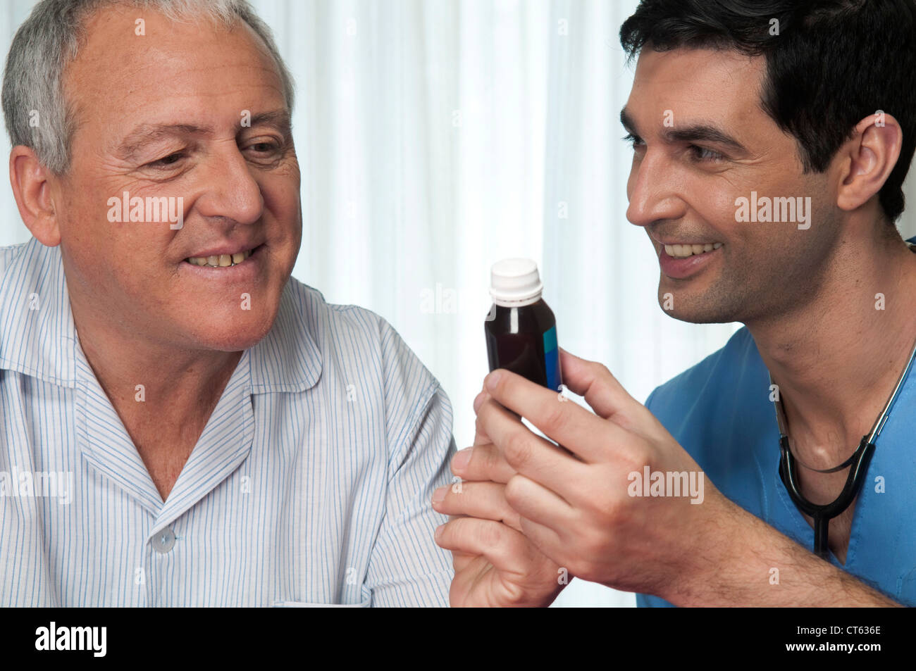 ELDERLY PERSON TAKING MEDICATION Stock Photo - Alamy