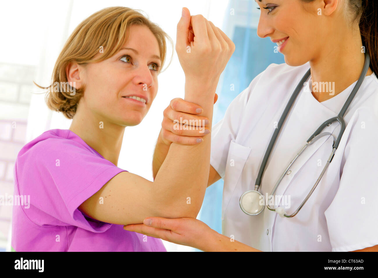 ELBOW SEMIOLOGY WOMAN Stock Photo - Alamy