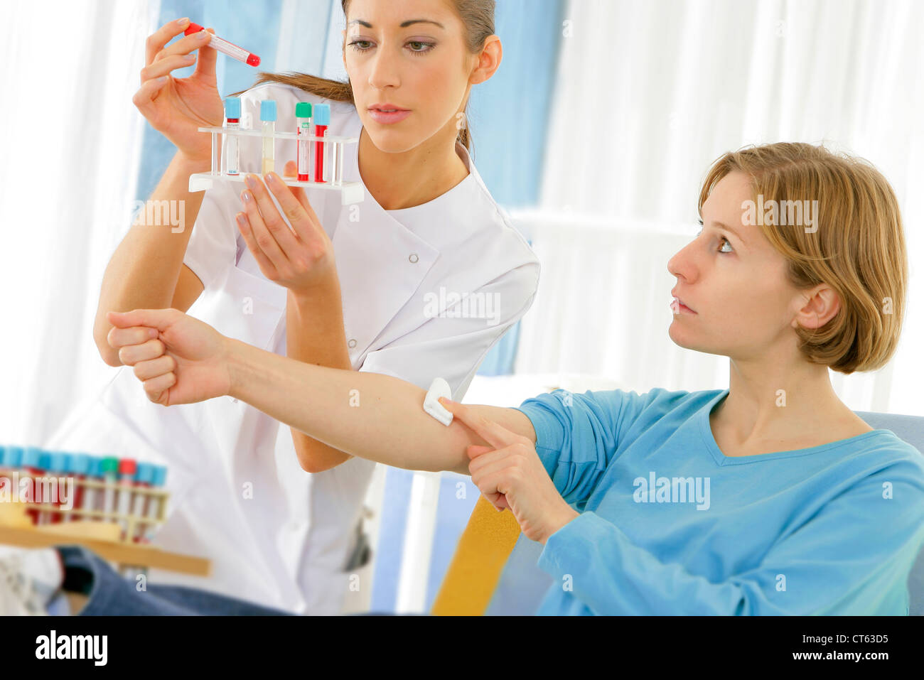 BLOOD SPECIMEN IN A WOMAN Stock Photo - Alamy