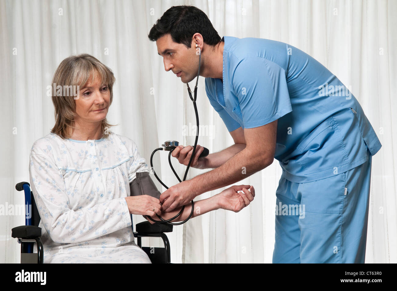 BLOOD PRESSURE, ELDERLY PERSON Stock Photo - Alamy