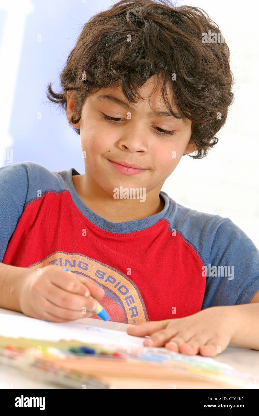 CHILD DRAWING INDOORS Stock Photo - Alamy
