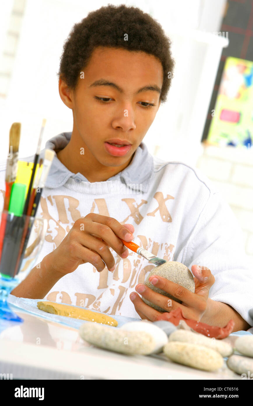 MANUAL ACTIVITY TEENAGER Stock Photo - Alamy