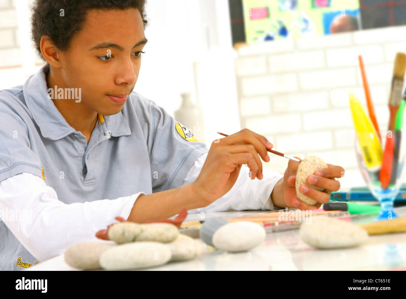 MANUAL ACTIVITY TEENAGER Stock Photo - Alamy