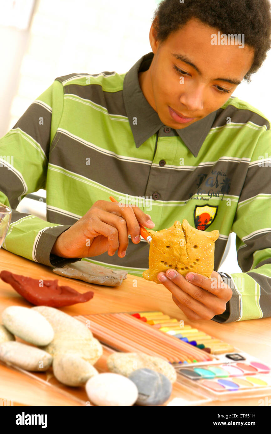 MANUAL ACTIVITY TEENAGER Stock Photo - Alamy