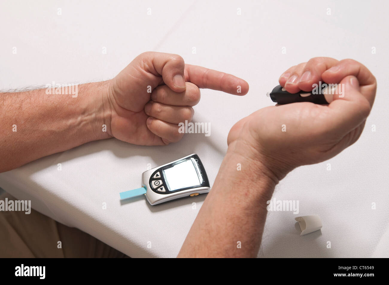 TEST FOR DIABETES ELDERLY PERSON Stock Photo - Alamy