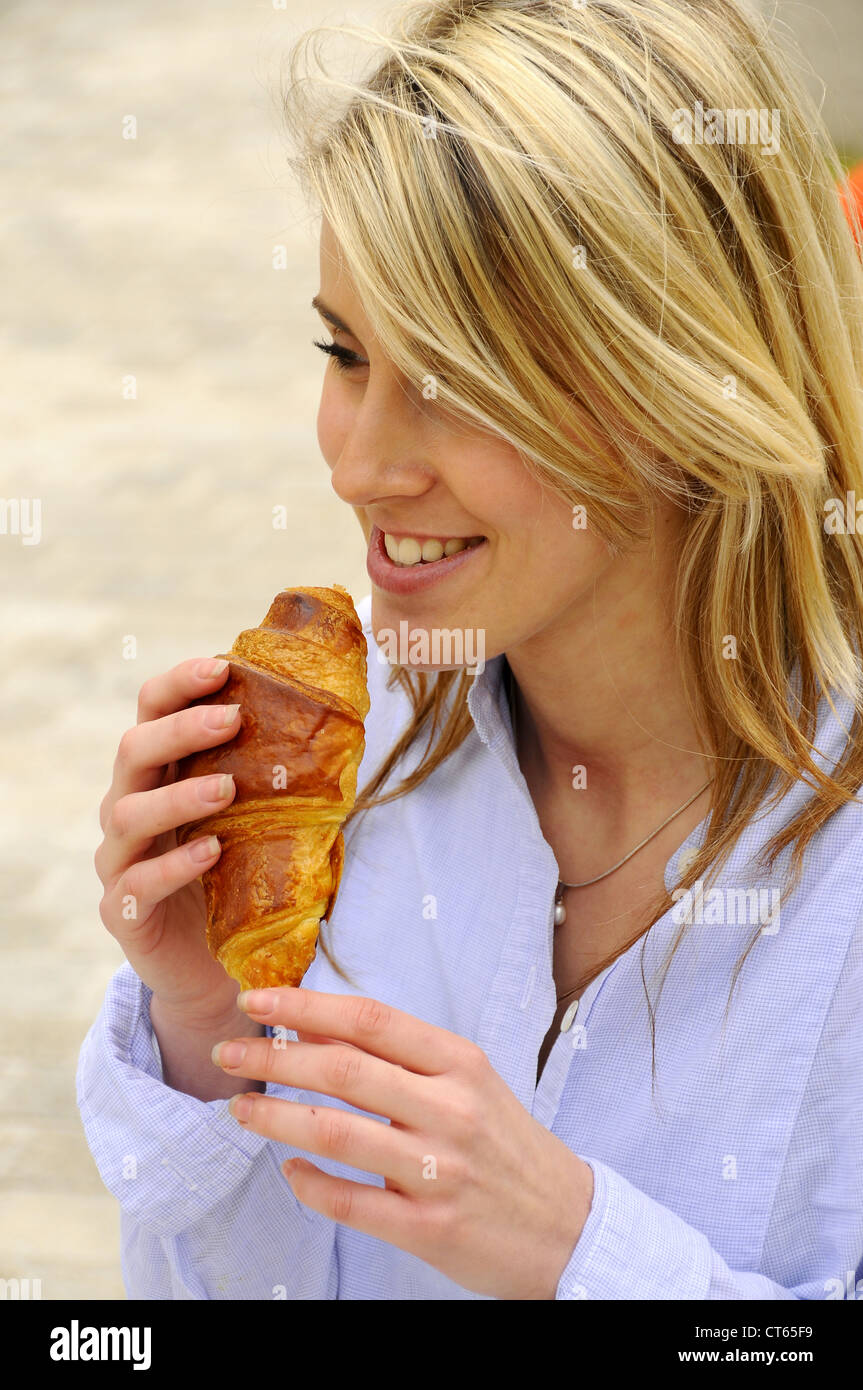WOMAN EATING BREAKFAST Stock Photo - Alamy