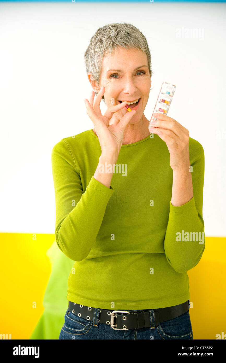 ELDERLY PERSON TAKING MEDICATION Stock Photo - Alamy