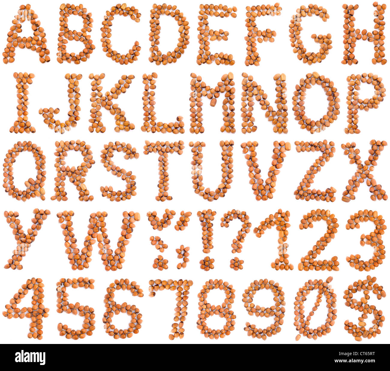 Alphabet and Numbers Made of Hazelnut Shells on White Background Stock ...