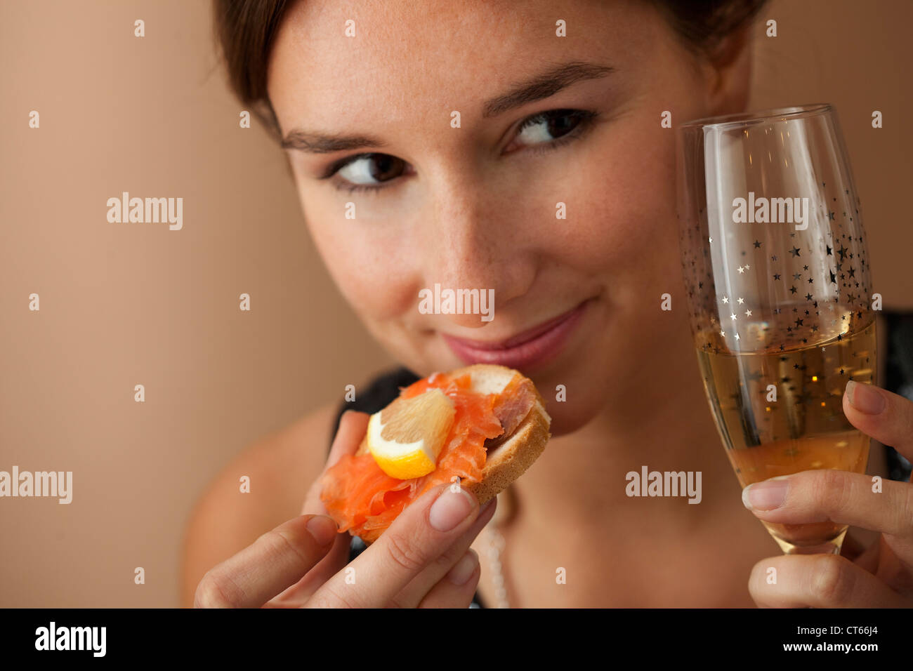 Woman feeding fish hi-res stock photography and images - Alamy