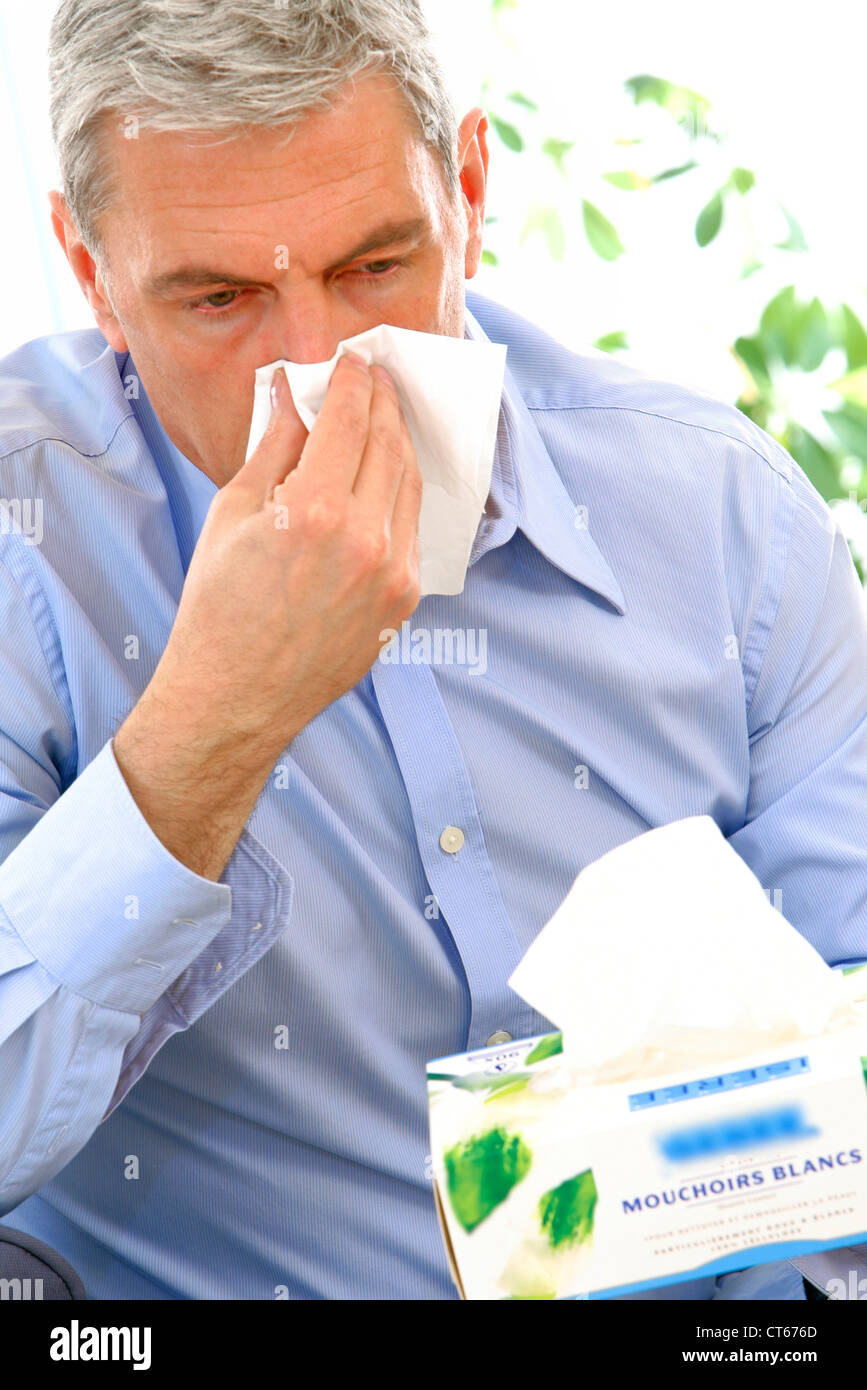 ELDERLY PERSON WITH RHINITIS Stock Photo - Alamy