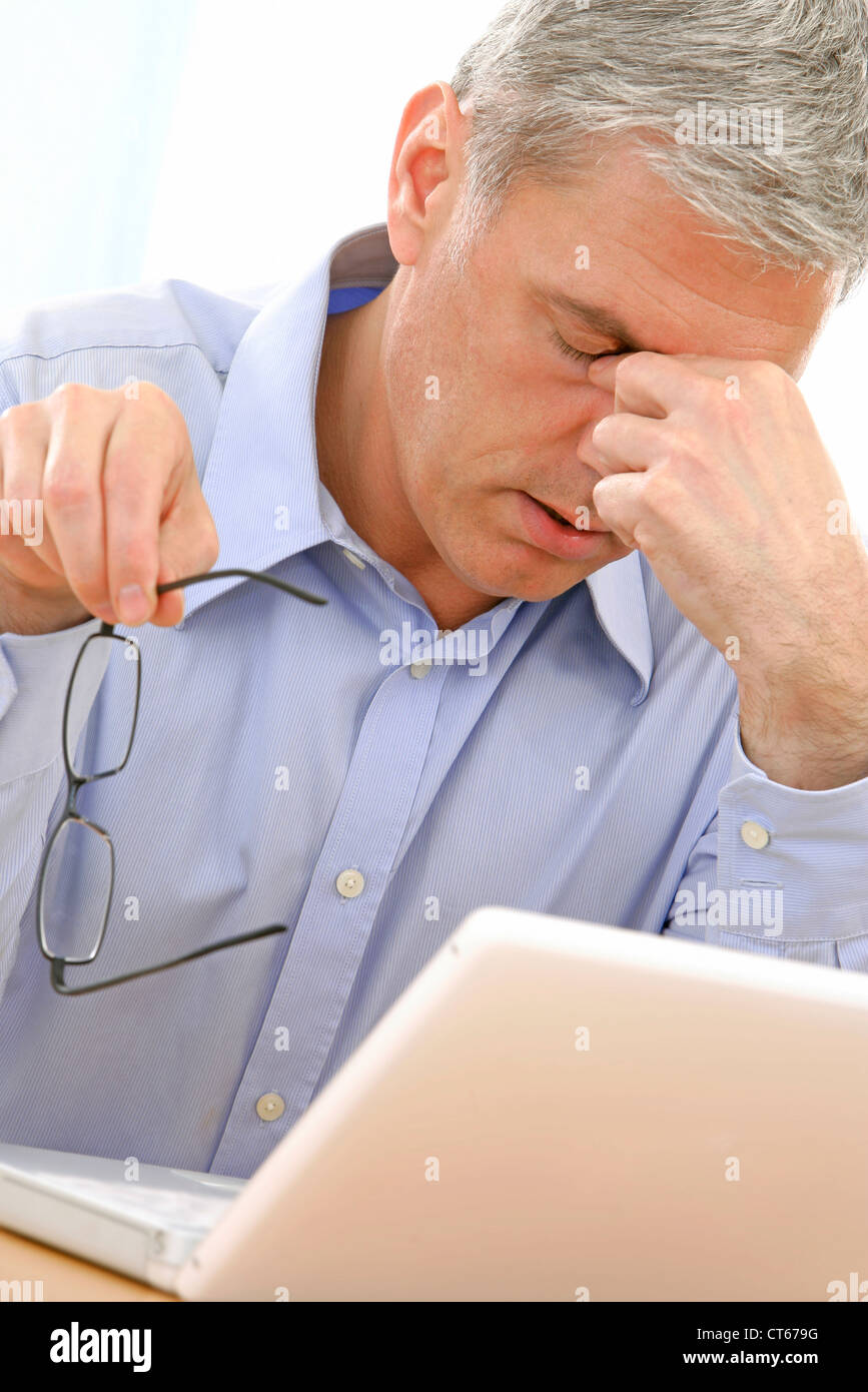 TIRED ELDERLY PERSON Stock Photo - Alamy