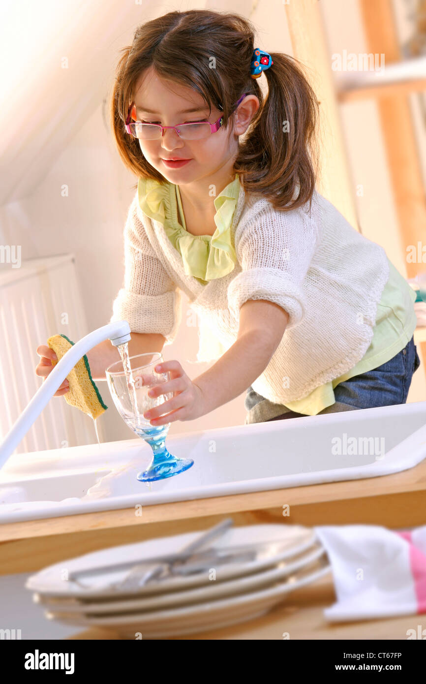 CHILD IN KITCHEN Stock Photo - Alamy