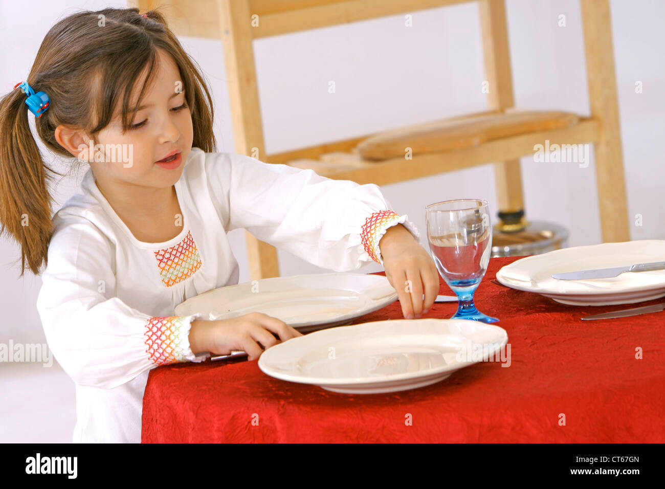 CHILD IN KITCHEN Stock Photo - Alamy