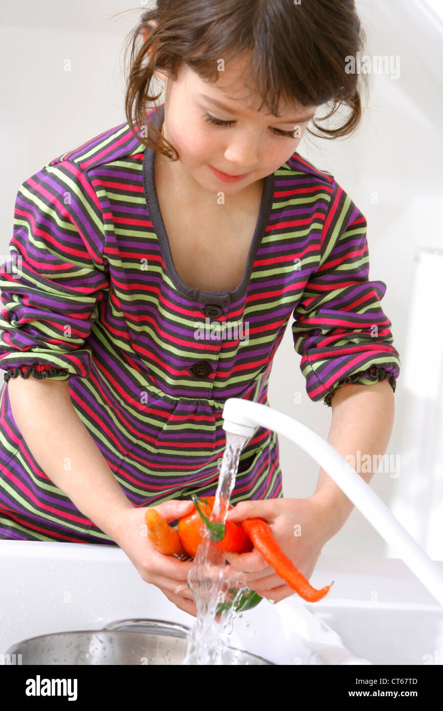 CHILD IN KITCHEN Stock Photo - Alamy