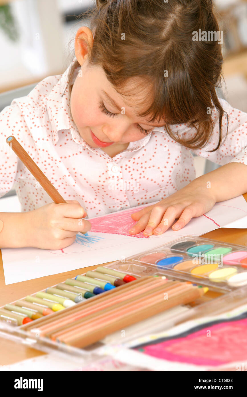 CHILD DRAWING INDOORS Stock Photo - Alamy