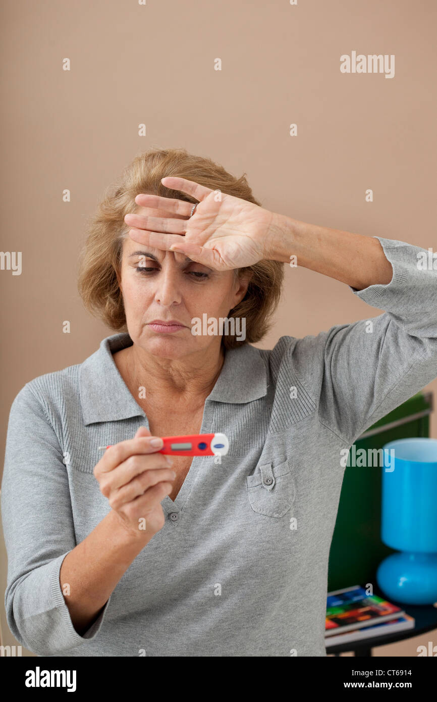FEVER IN AN ELDERLY PERSON Stock Photo - Alamy