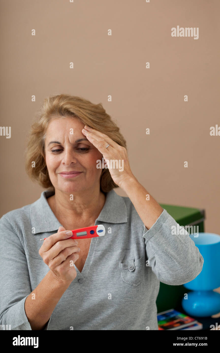 FEVER IN AN ELDERLY PERSON Stock Photo - Alamy