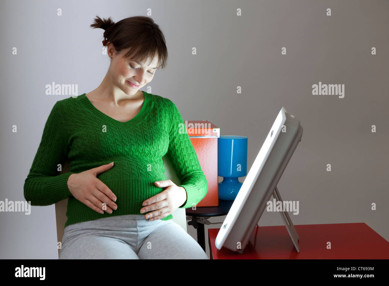 PREGNANT WOMAN LIGHT THERAPY Stock Photo - Alamy