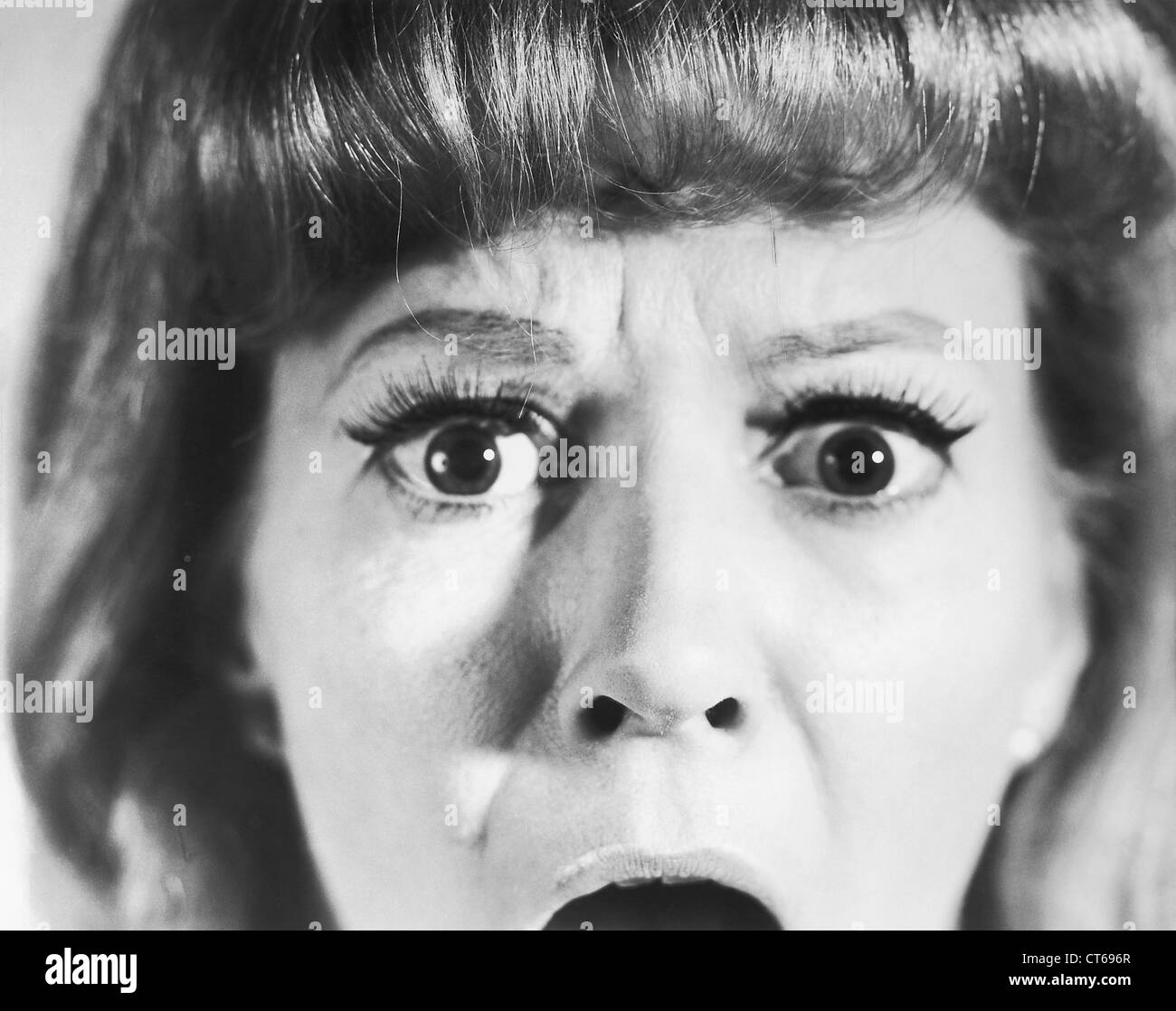 Frightened woman Black and White Stock Photos & Images - Alamy