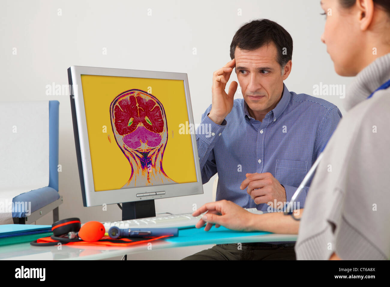 NEUROLOGY CONSULTATION MAN Stock Photo - Alamy