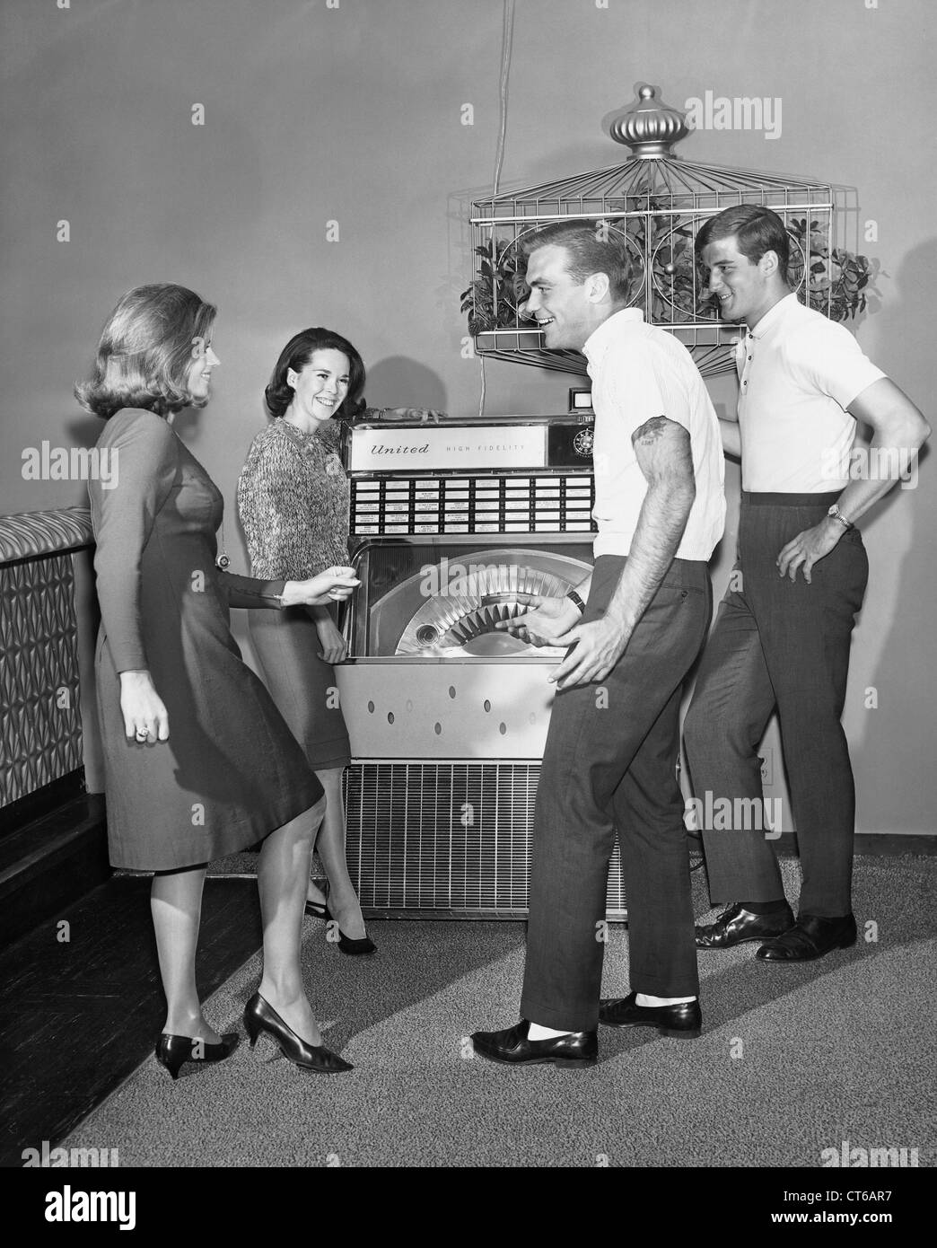 Teenagers dancing in front of jukebox Stock Photo - Alamy