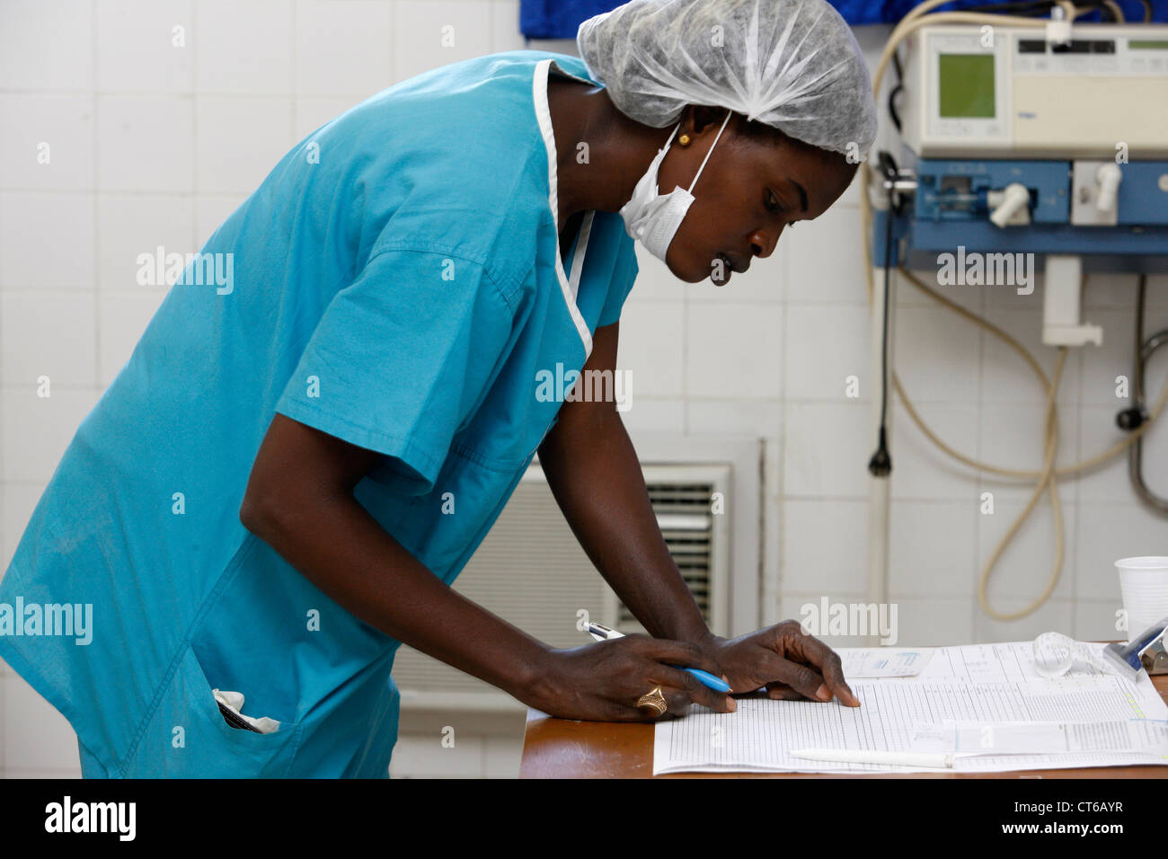 NURSE WITH PATIENT'S RECORD Stock Photo - Alamy