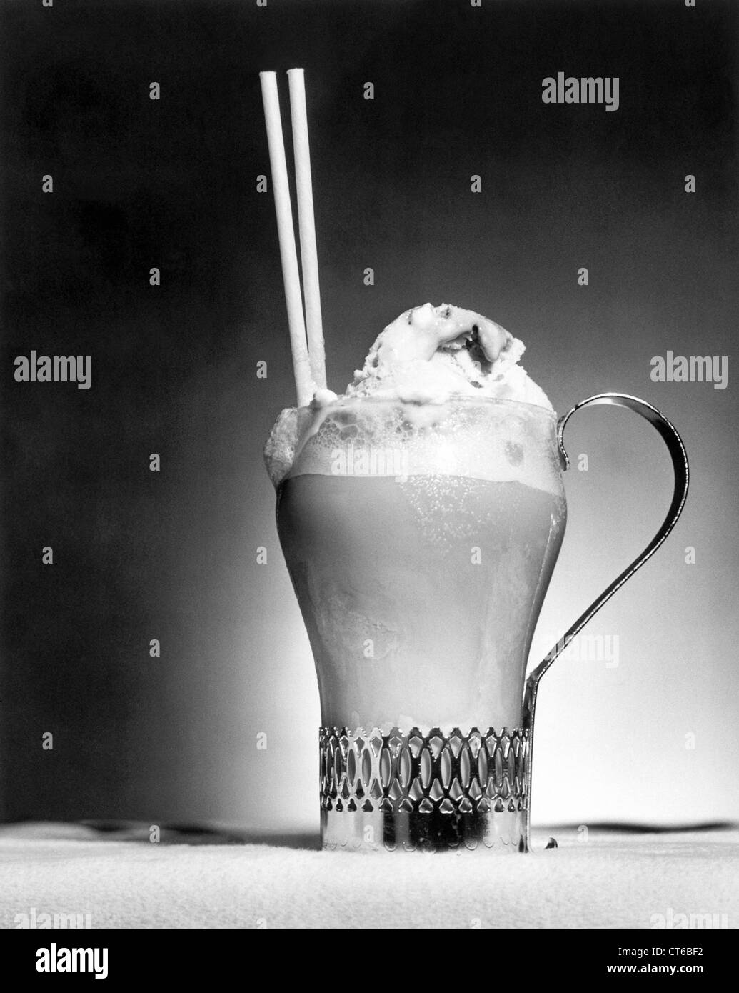 Vintage image of milk shake with two straws Stock Photo - Alamy