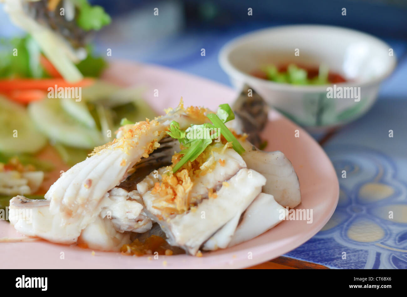 fresh steam fish with seafood sauce and vegetable Stock Photo - Alamy