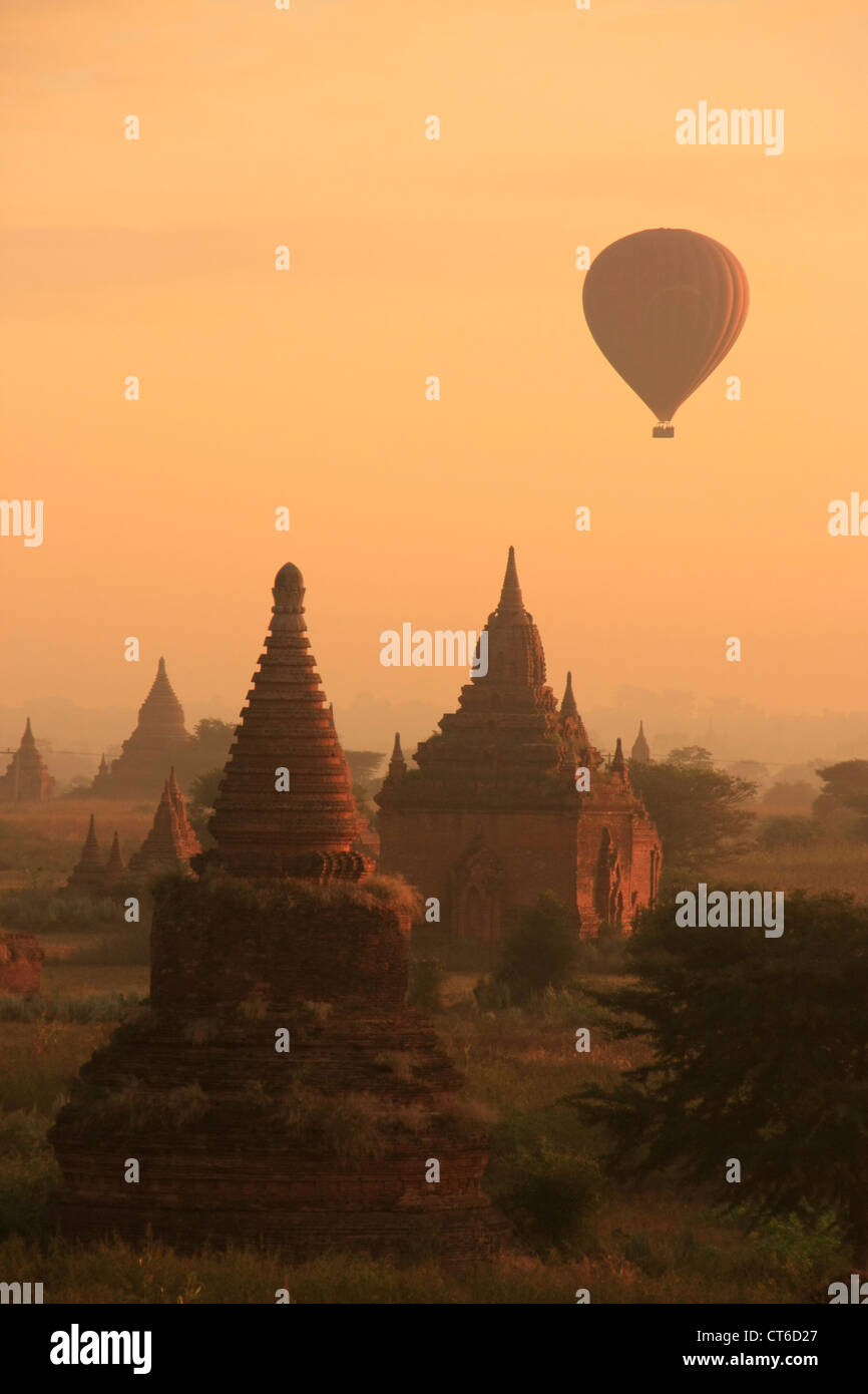 Morning scene with hot-air balloons over temples of Bagan, Bagan ...