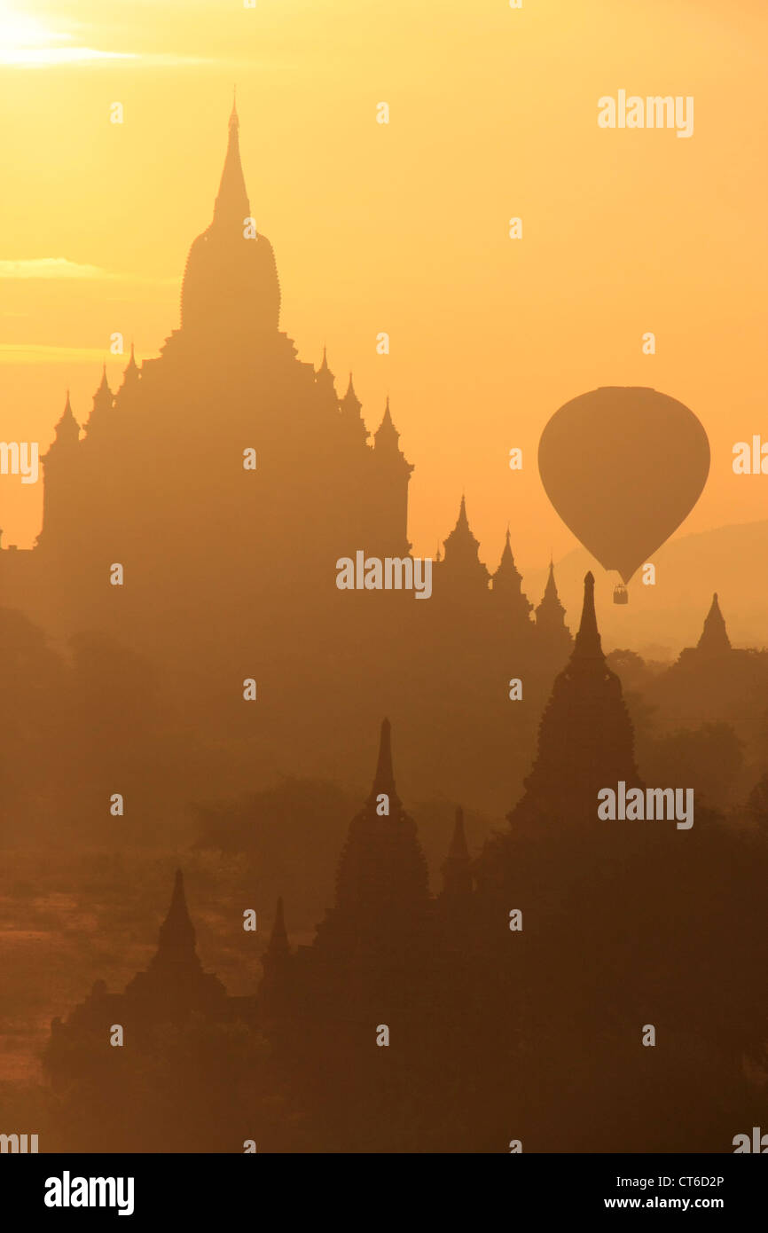 Morning scene with hot-air balloon over temples of Bagan, Bagan ...
