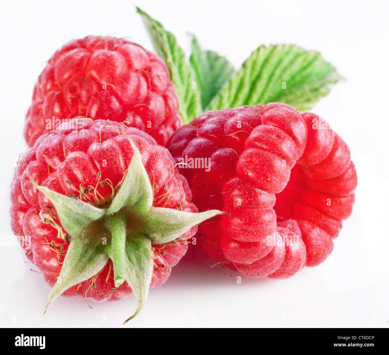 Ripe raspberries isolated on a white background Stock Photo - Alamy