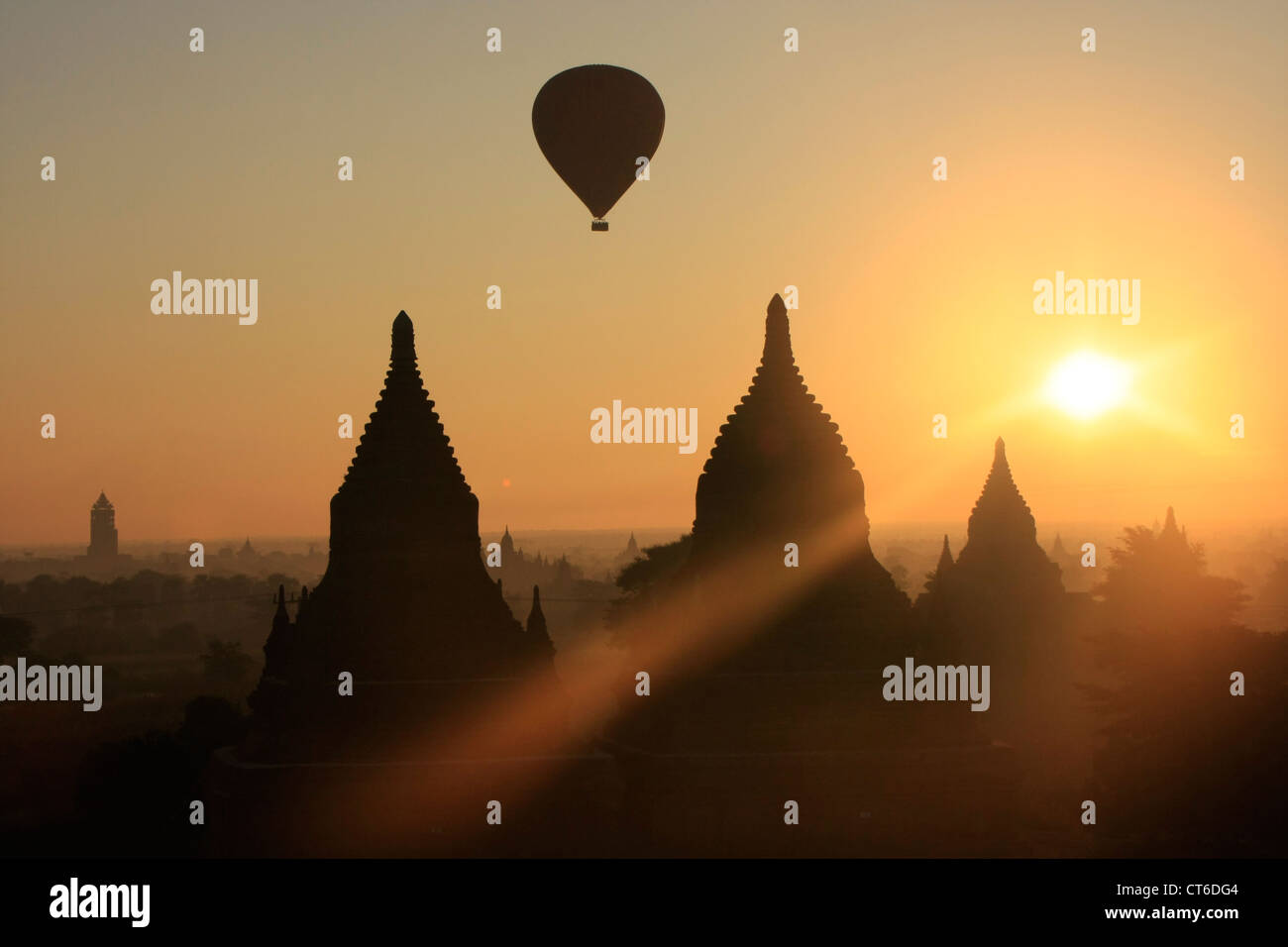 Morning scene with hot-air balloons over temples of Bagan, Bagan ...
