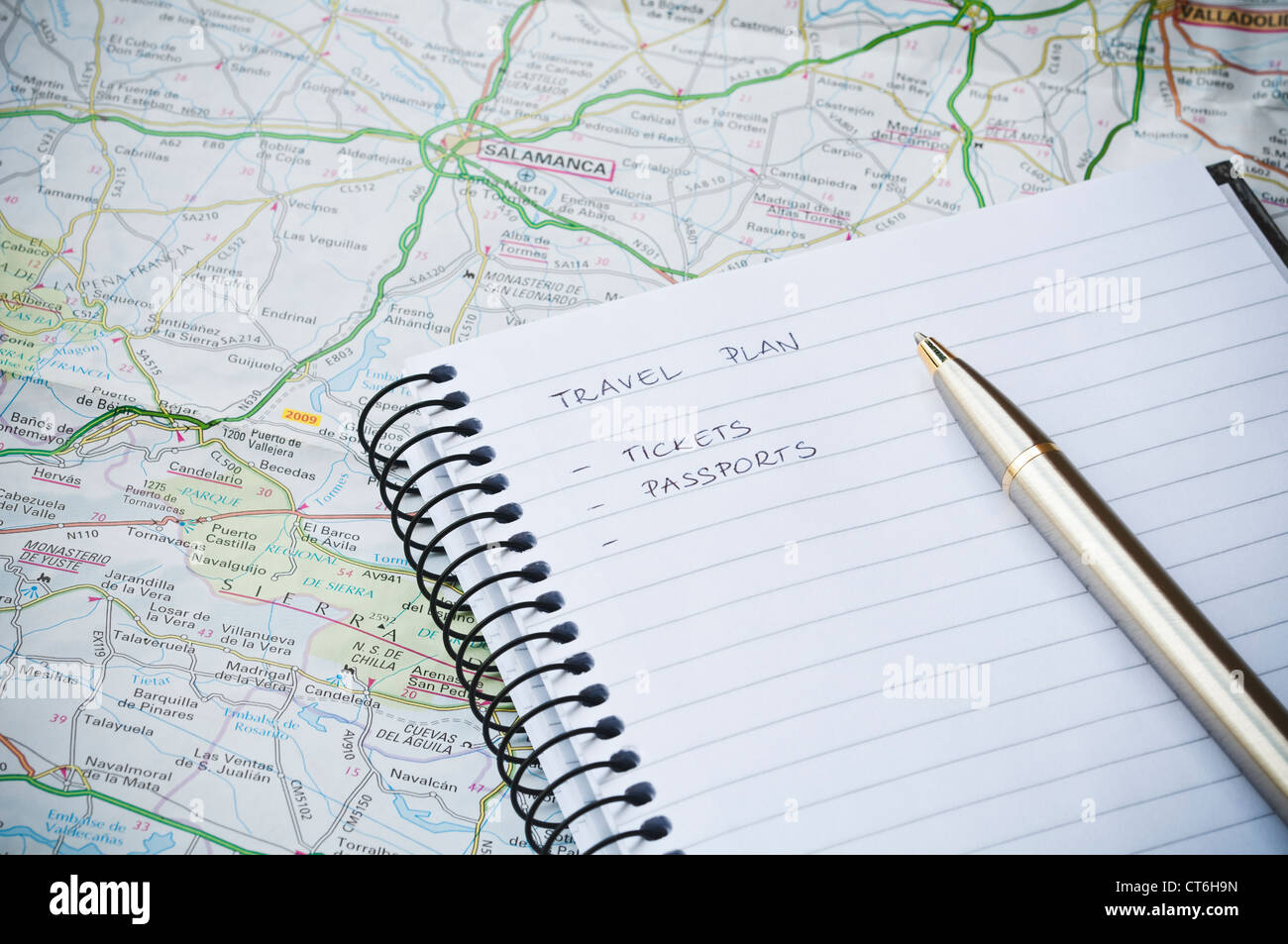 Travel plan concept with notebook, writing, map and ballpoint pen Stock ...